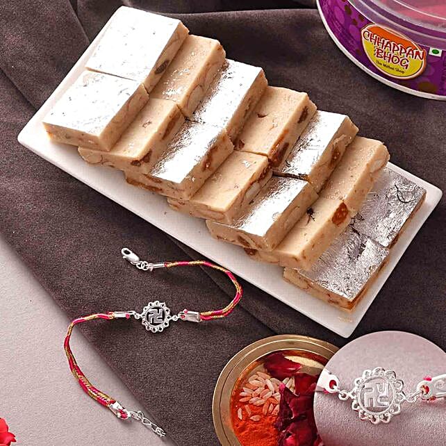Designer Swastik Silver Rakhi And Kaju Anjeer Burfi egypt | Gift ...