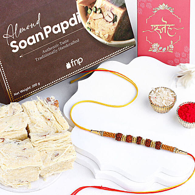 Celestial Charms Rudraksha Rakhi & Almond Soan Papdi Gift Set indonesia ...