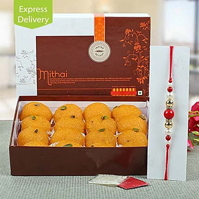 Buy/Send Moti Chur Ladoo And Rakhi Deluxe Online- FNP