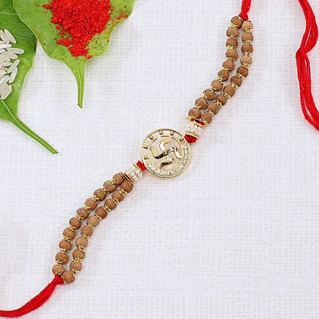Buy/Send Swastik Chandan Rakhi Online- FNP