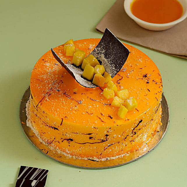 Buy/Send Exquisite Mango Cake 2Kg Eggless For CRED Online- FNP