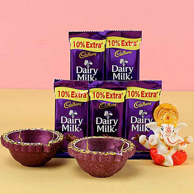 Buy/Send Lord Ganesha Idol & Dairy Milk Combo Online- FNP