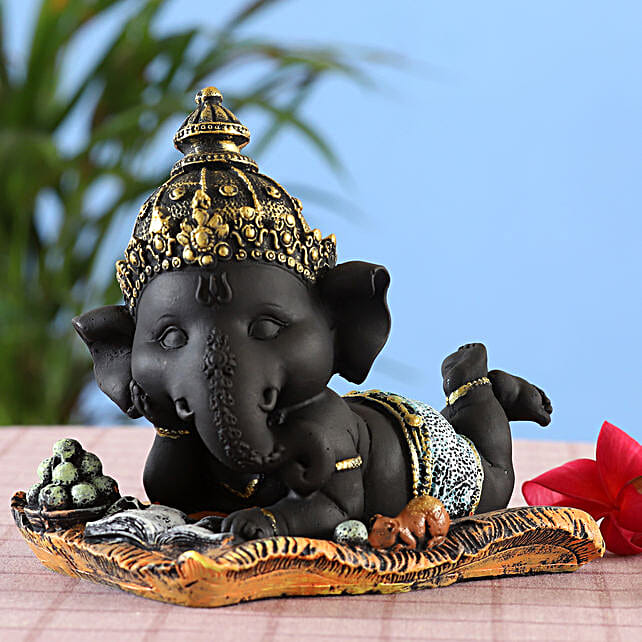 Buy/Send Cute Matte Black Resting Bal Ganesha Idol Online- FNP