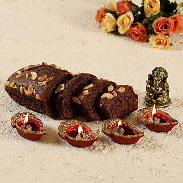 Buy/Send Multi Colour Ganesha With Diyas & Plum Dry Cake Online- FNP