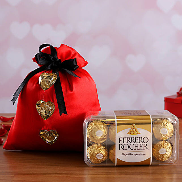 Buy/Send Ferrero Rocher Box In Red Satin Potli Online- FNP