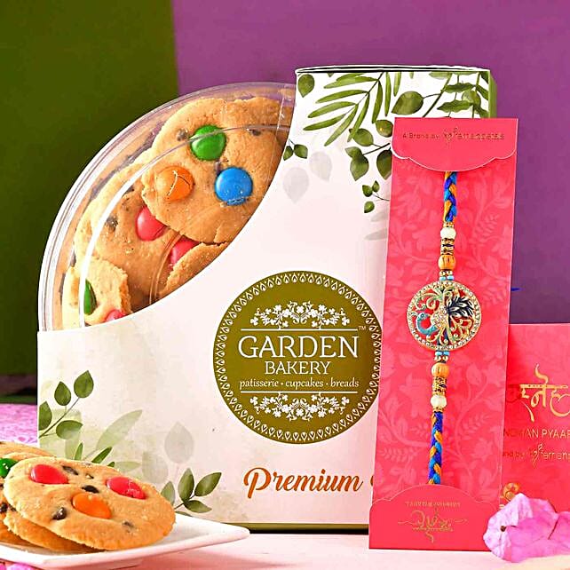 Buy/Send Peacock Rakhi N Chocolate Gems Cookies Combo Online- FNP