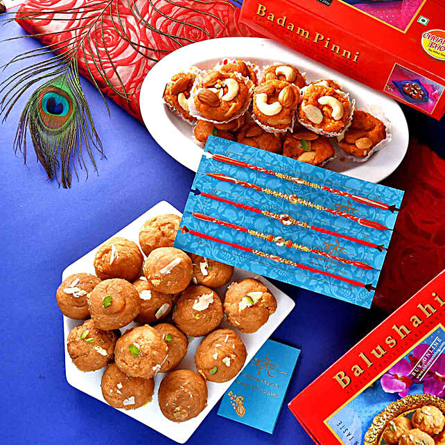 Buy/Send 5 Crystal Rudraksha Rakhis With Badam Pinni & Balushahi Online ...