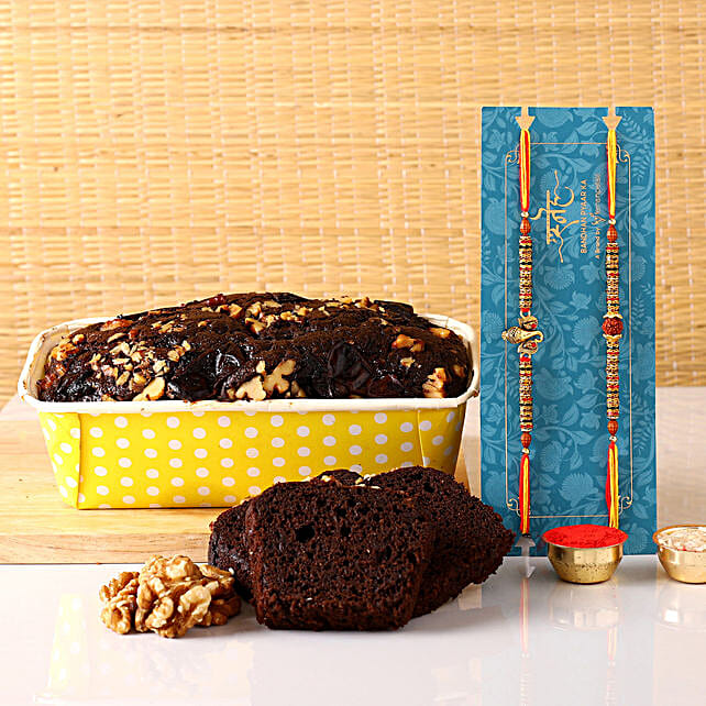 Buy/Send Holy Rakhi Set & Delicious Dry Cake Hamper Online- FNP