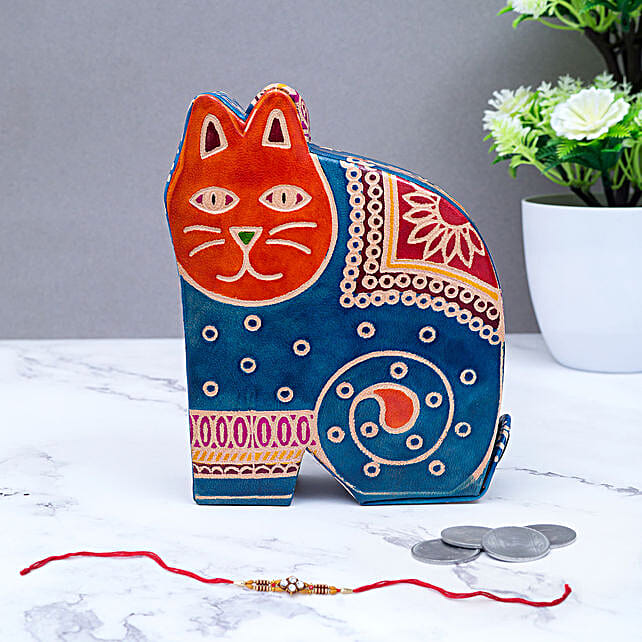 Buy/Send Designer Rakhi and Cat Shaped Coin Box Online- FNP