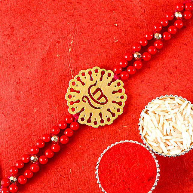 Buy/Send Om In Punjabi Premium Rakhi Online- FNP