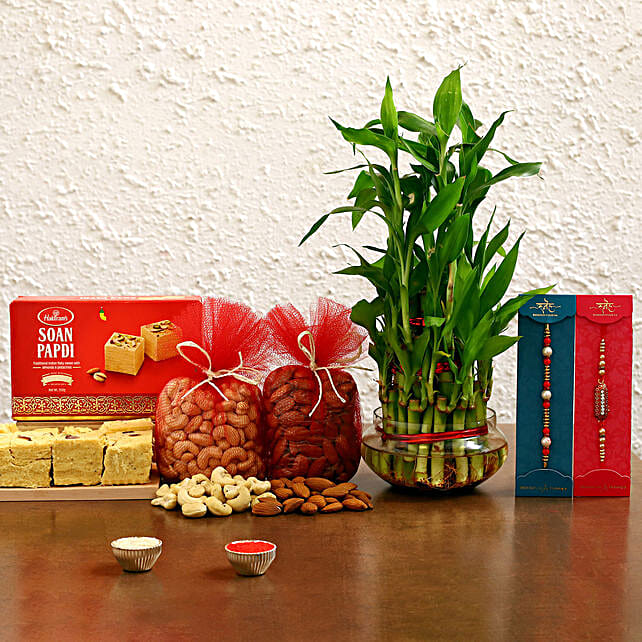 Buy/Send Set of 2 Rakhi & Three Layer Bamboo With Sweet Treats Online- FNP