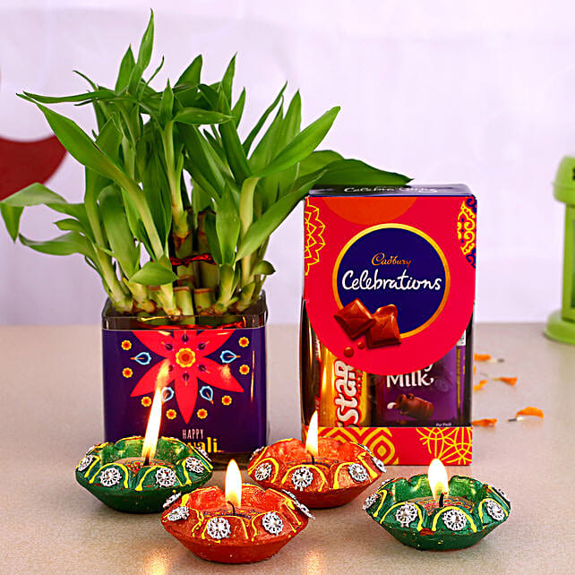 Buy/Send Bamboo Plant Happy Diwali Pot With Diyas and Chocolates Online ...