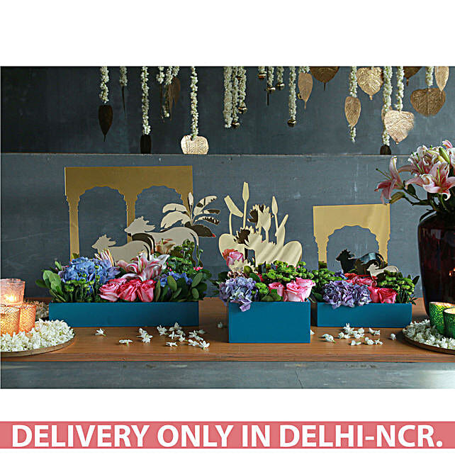 Buy/Send Colourful Flowers & Divine Nandi Arrangement Online- FNP