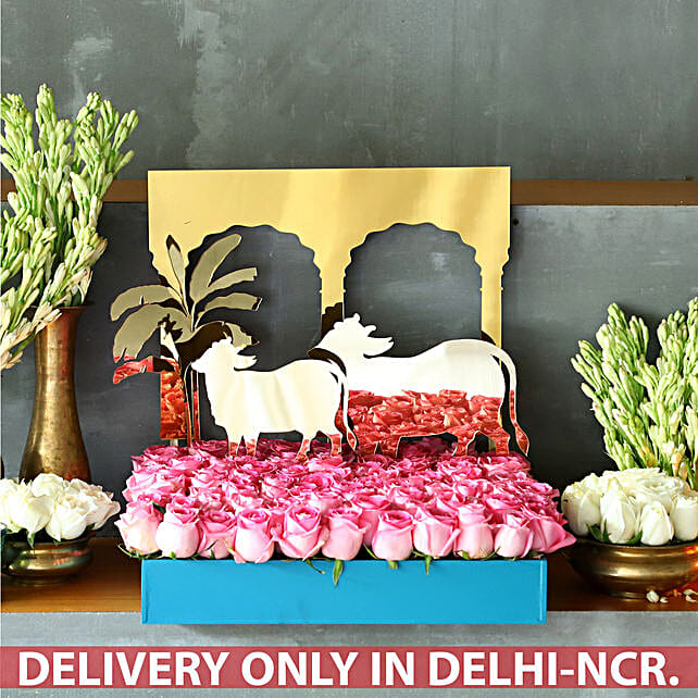 Buy/Send Emma Roses & Divine Nandi Arrangement Online- FNP