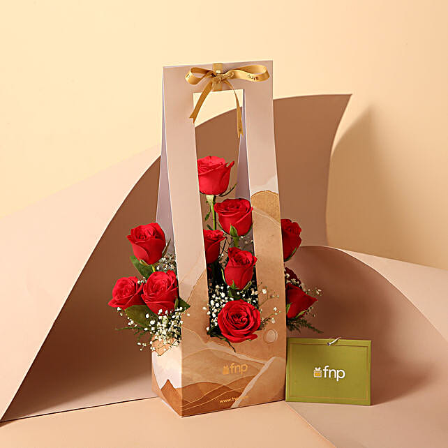 Buy/Send Red Roses In FNP Paper Flower Holder Online- FNP
