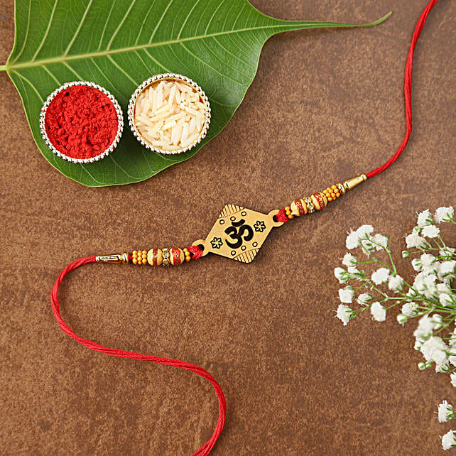 Buy/Send Sneh Traditional Om Rakhi Online- FNP