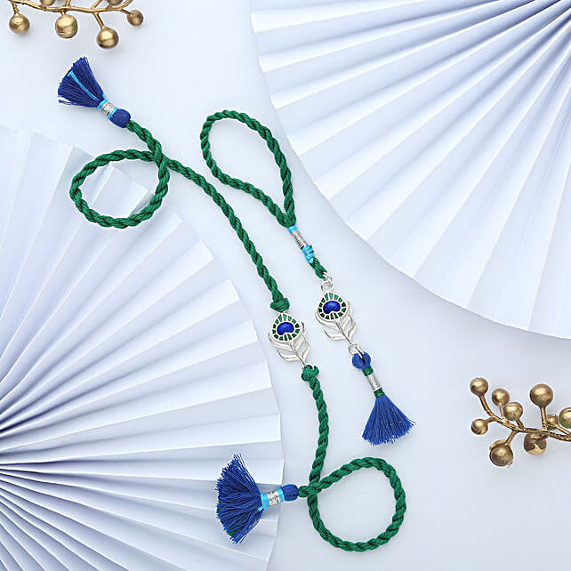 Buy/Send Sneh Mor Pankh Silver Rakhi Online- FNP