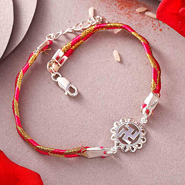 Buy/Send Spiritual Swastik Silver Rakhi Online- FNP