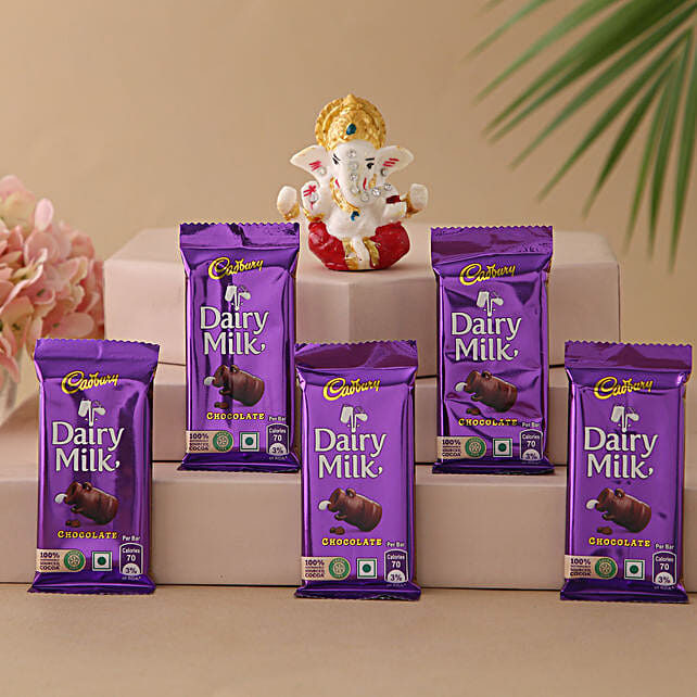 Buy/Send Blissful Diwali Dairy Milk N Ganesha Idol Combo Online- FNP