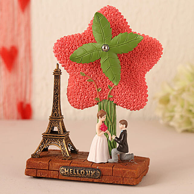 Buy/Send Flower Couple Eiffel Tower Showpiece Online- FNP