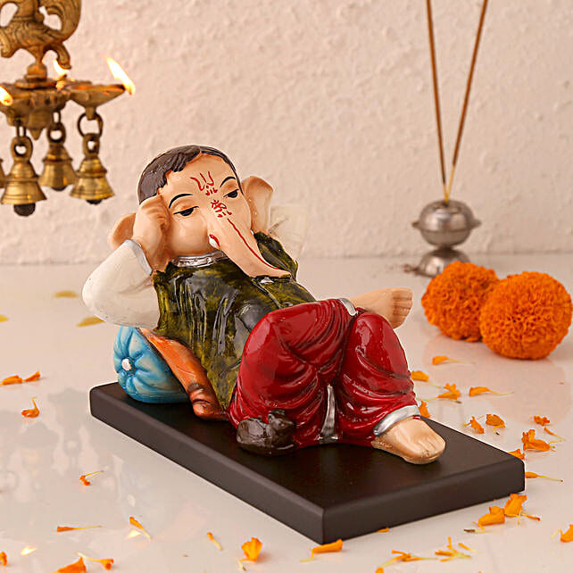 Buy/Send Multicoloured Resting Ganesha Idol Online- FNP