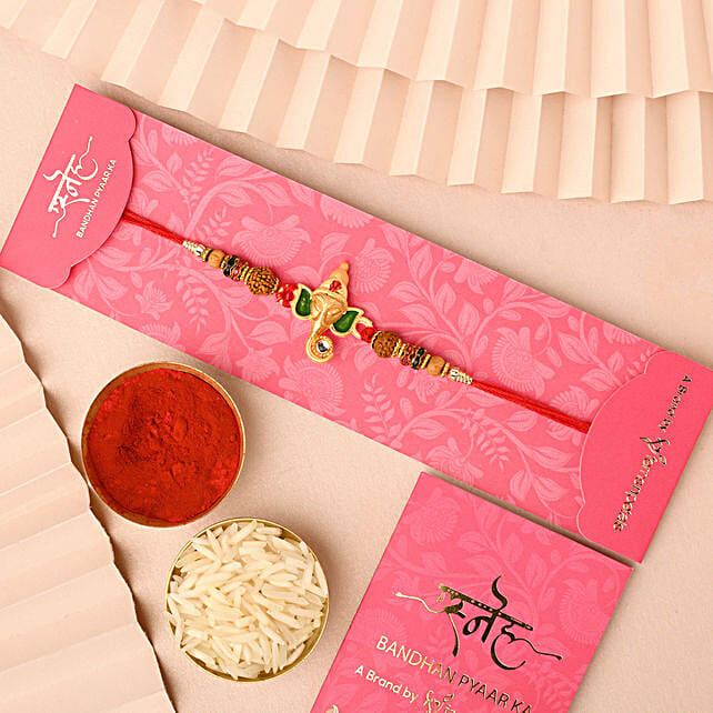 Buy/Send Sneh Golden Shri Ram Rakhi Online- FNP