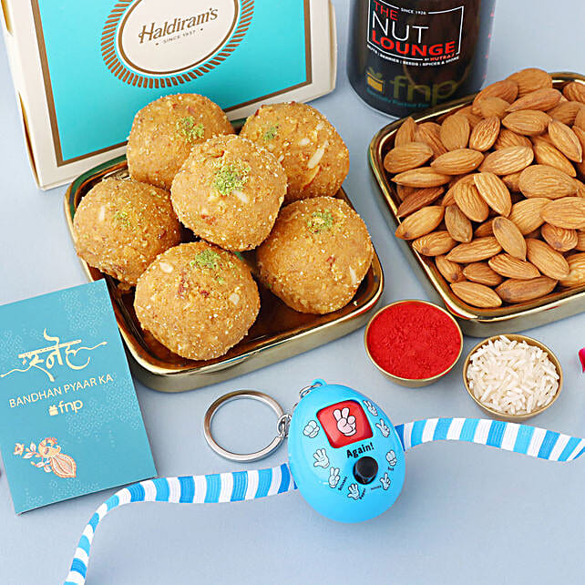 Buy/Send Sneh Sports Push Button Rakhi & Savoury Delights Online- FNP