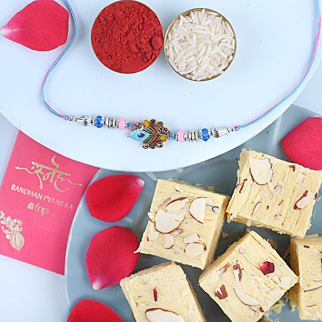 Buy/Send Sneh Meenakari Rakhi Set with Soan Papdi Online- FNP