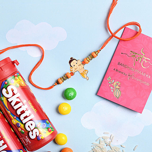 Buy/Send Sneh Bal Ganesha Rakhi for Kids with Skittles Online- FNP