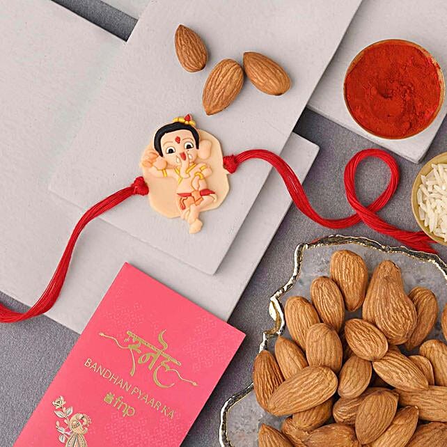 Buy/Send Sneh Bal Ganesha Rakhi & Almonds Combo Online- FNP