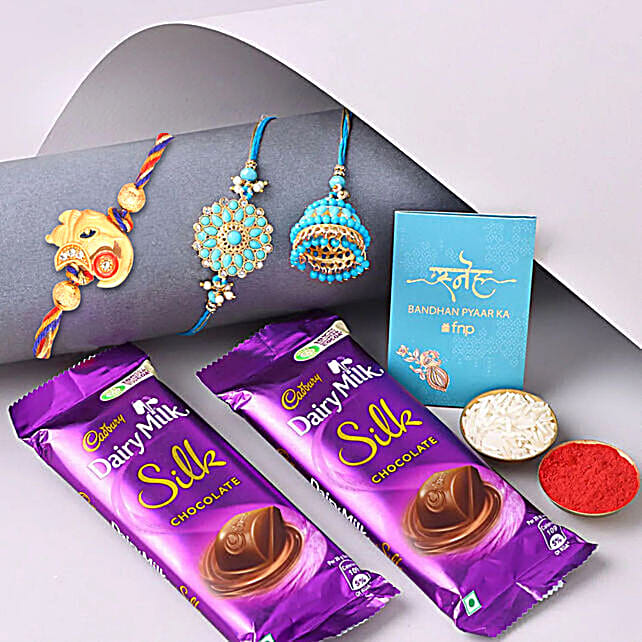 Buy/Send Sneh Bal Ganesha with Bhaiya Bhabhi rakhi set Online- FNP