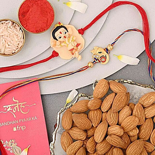 Buy/Send Sneh Blessed Ganesha Rakhi Set and Almonds Combo Online- FNP