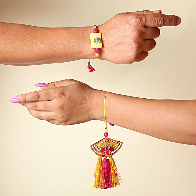 Buy/Send Golden Aura Bhaiya Bhabhi Rakhi Set Online- FNP