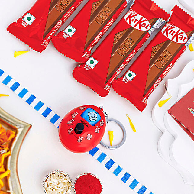 Buy/Send Playful Rock-Paper-Scissors Toy Rakhi & Chocolaty Delights ...