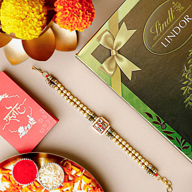 Buy/Send Regal Ethnic Work Rakhi & Lindt Chocolate Gift Set Online- FNP