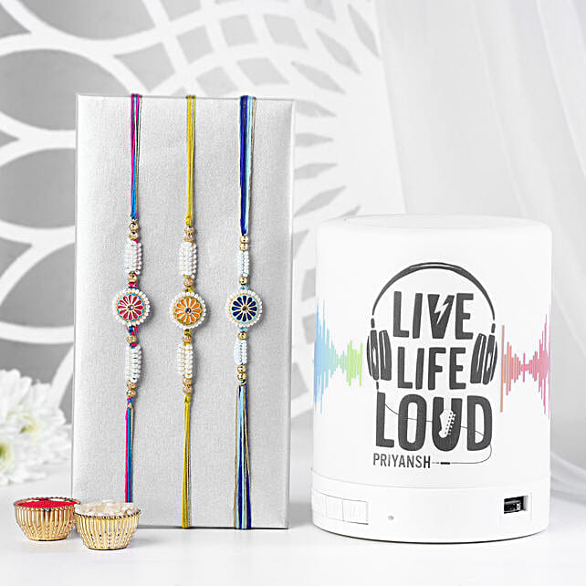 Buy/Send Meenakari Artistic Rakhi Set & Personalised LED Speaker Online ...