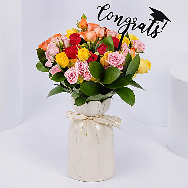 Mixed Color Baby Roses Vase Arrangement | Graduation Day qatar | Gift ...
