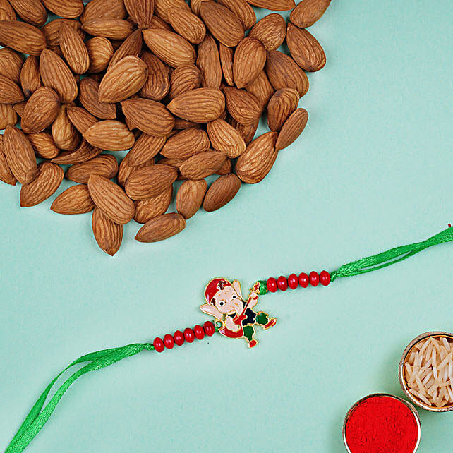 Appealing Bal Ganesha Kids Rakhi And Almonds singapore | Gift Appealing ...