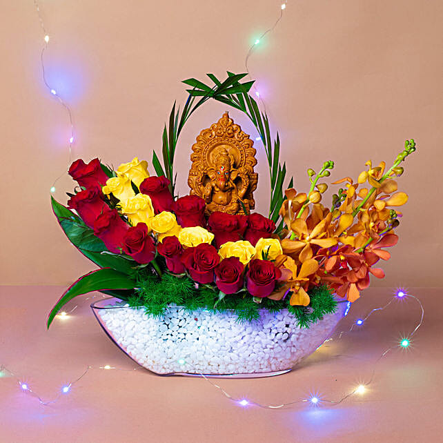 Colourful Flowers N Ganesha Idol Ship Shaped Vase singapore | Gift ...