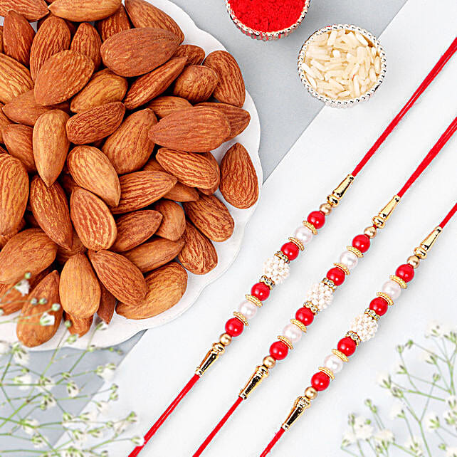 Pearl Rakhi Set of 3 with Almonds singapore | Gift Pearl Rakhi Set of 3 ...
