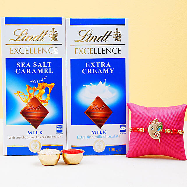 Alluring Silver Ganesha Rakhi And 2 Lindt Chocolates sweden | Gift ...