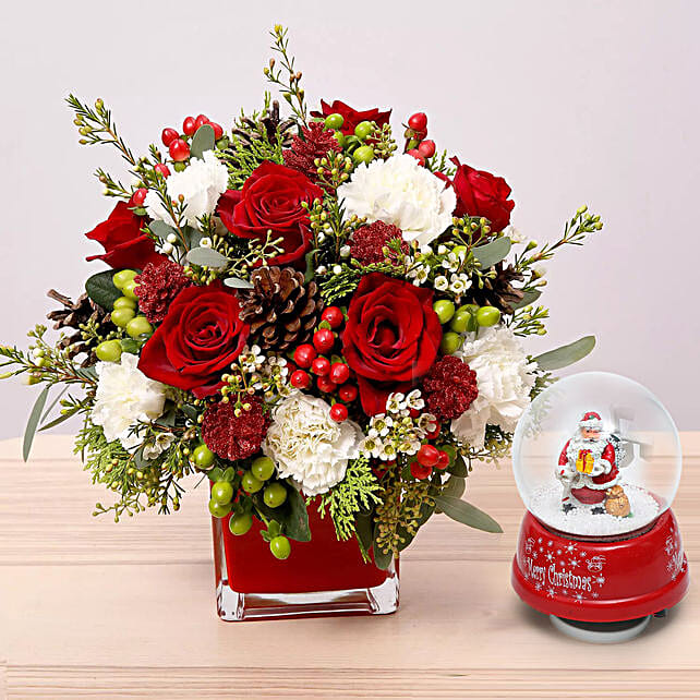 Flower Arrangement With Santa Masterpiece uae | Gift Flower Arrangement ...