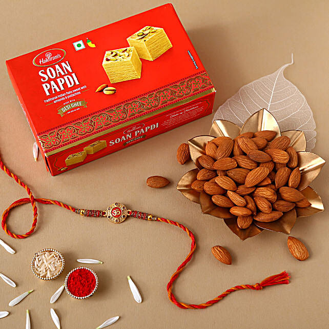 Sneh Traditional Om Rakhi with 250 Grams Soan Papdi and Almonds uae ...