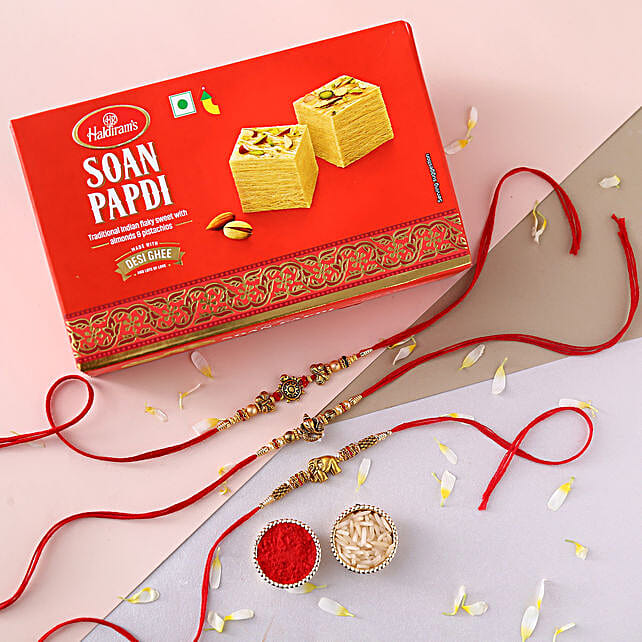Traditional Feng Shui Rakhi Set with 500 Grams Soan papdi uae | Gift ...