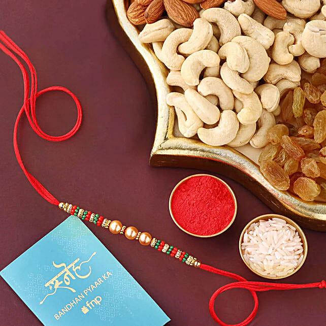 Sneh Gleaming Pearls Rakhi Set & Dry fruit Mix uae | Gift Sneh Gleaming ...