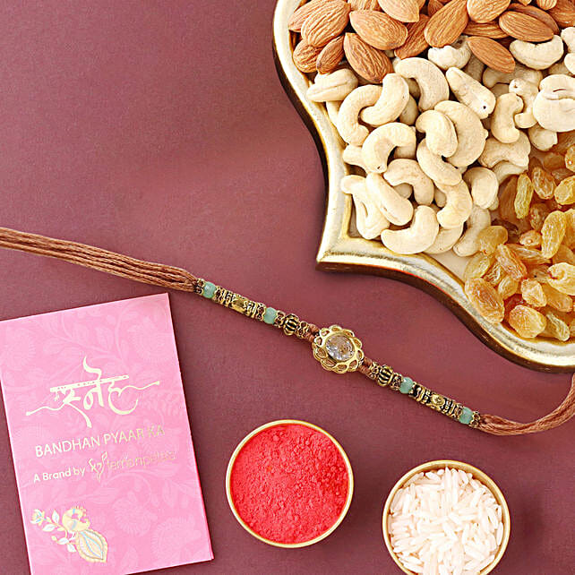Sneh Lustrous Stone Rakhi & Dry Fruit Mix uae | Gift Sneh Lustrous ...