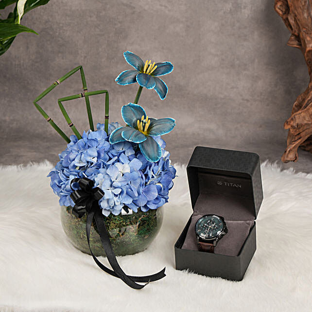 Titan Blue Dial Strap watch for men with exquisite floweral arrangment ...
