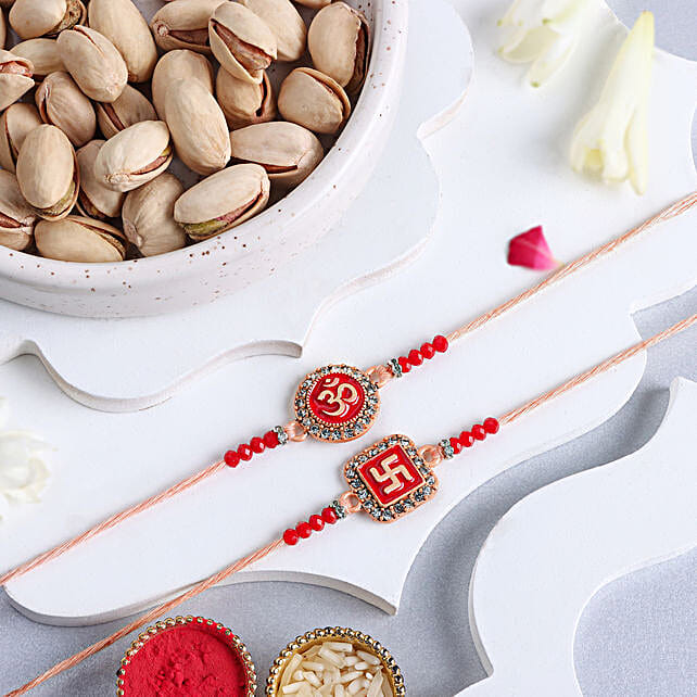 Ethereal Om Swastik Pair Rakhi & Pistachio Delight uk | Gift Ethereal ...