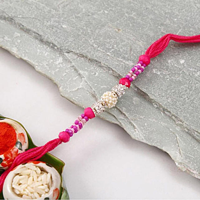 Elegant Pink Thread Rakhi usa | Gift Elegant Pink Thread Rakhi- FNP