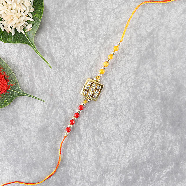 Vibrant Swastika Rakhi usa | Gift Vibrant Swastika Rakhi- FNP